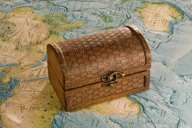 Wooden chest on the map stock photo. Image of luxury, brown - 9609294