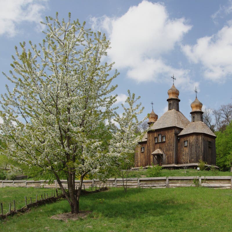 Wooden Church with Blooming Tree Stock Image - Image of orthodox ...
