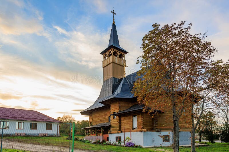 Wooden Church at Sunset with Autumn Tree and Sky Stock Image - Image of ...