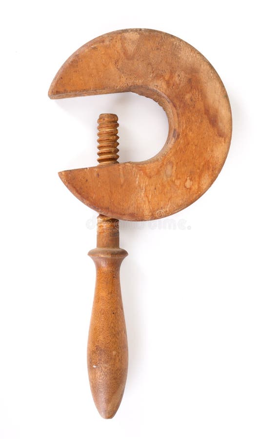 Old Fashioned Clamp Holding Curved Wood Being Used To Build a Wooden ...