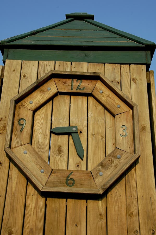 Wooden Clock stock image. Image of hour, wood, alarm, playground - 1086707