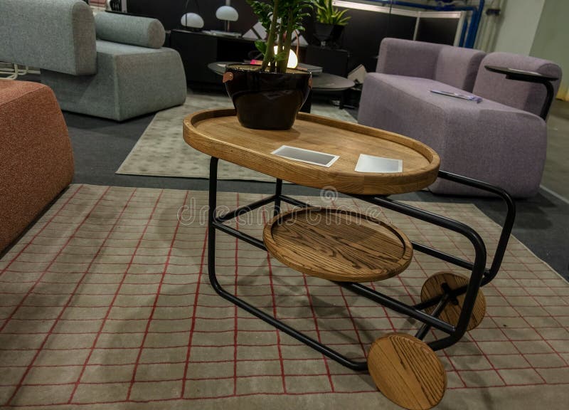 Wooden Coffee Table on Wheels in the Interior of the Room with a Round ...