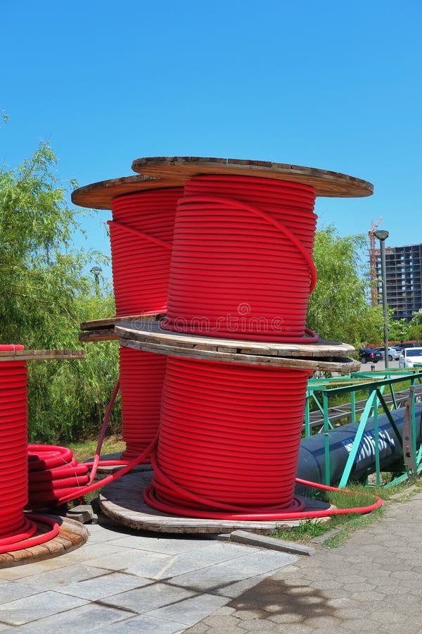 Wooden Coils of Electric Cable Outdoor. High and Low Voltage Cables in ...