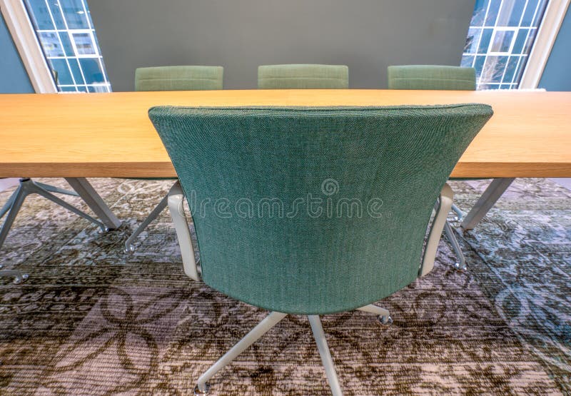 Wooden Conference Table and Chairs in a Corporate Conference Room Stock ...