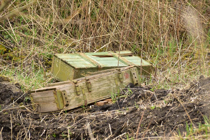 Wooden Boxes for Shells Lie on the Grass. Stock Image - Image of ...