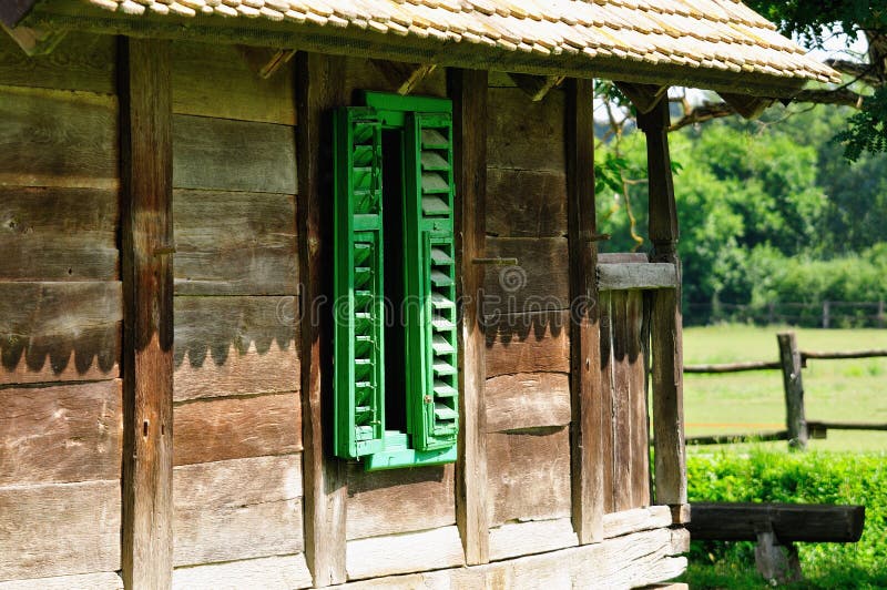 Wooden cottage on the farm stock photo. Image of grass - 54557000