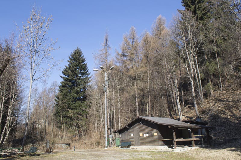 Wooden Cottage in the Nature with Many Trees Stock Image - Image of ...