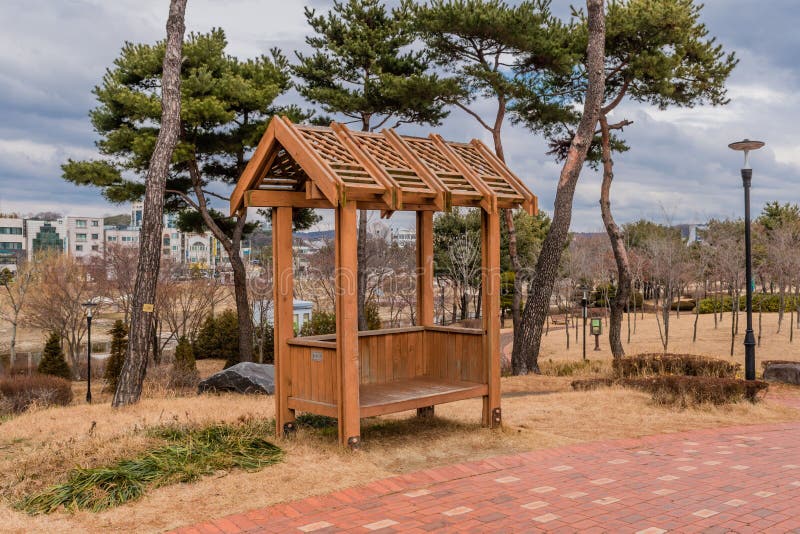 Covered Park Benches on Brick Patio Stock Image - Image of patio ...