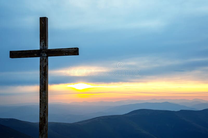 Wooden Cross on a Background of Sunrise in the Mountains Stock Photo ...
