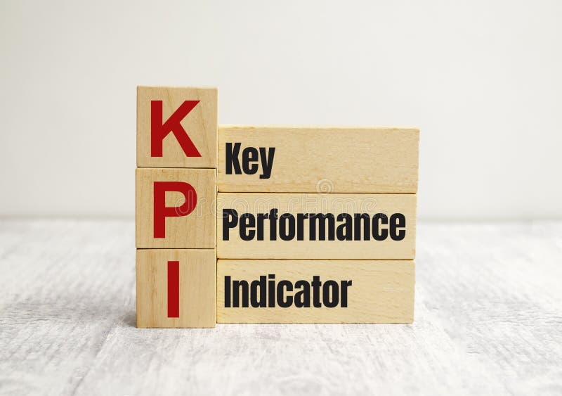 KEY PERFORMANCE INDICATOR Words on Magnifier Glass with Dollars and ...