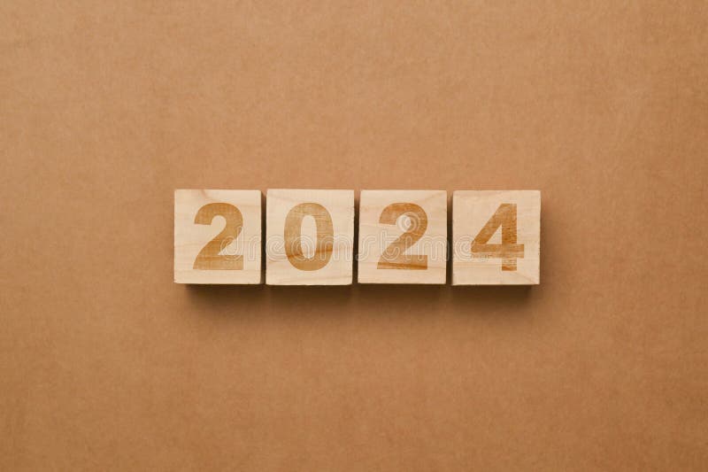 Wooden Cube Blocks with 2024 on Brown Background. Start New Year Goals ...