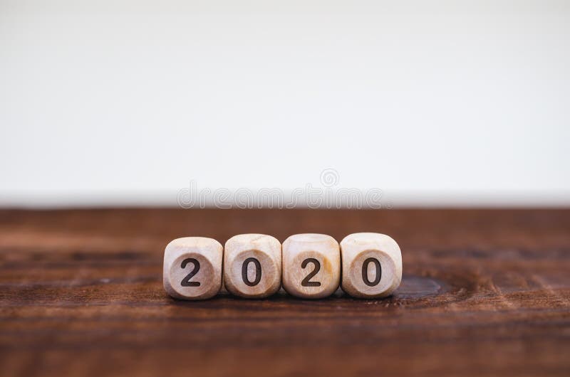 Wooden Cube Shape with Text on Dark Table 2020, Copy Space Stock Photo ...