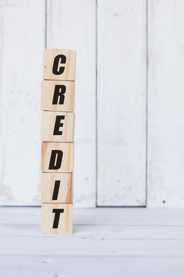 Wooden Cube, with the Word Credit, with White Wooden Background Stock ...