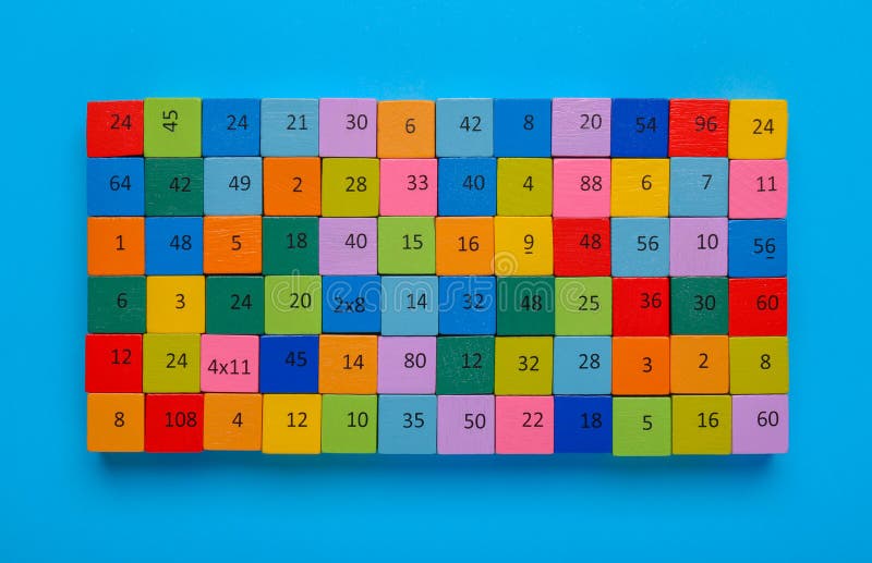 Wooden Cubes with Different Numbers on Light Blue Background, Top View ...