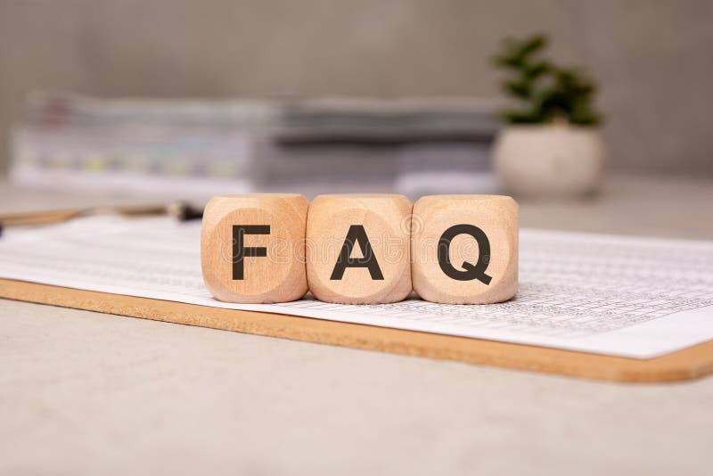 Wooden Cubes with FAQ Letters on Document Background. Stock Photo ...