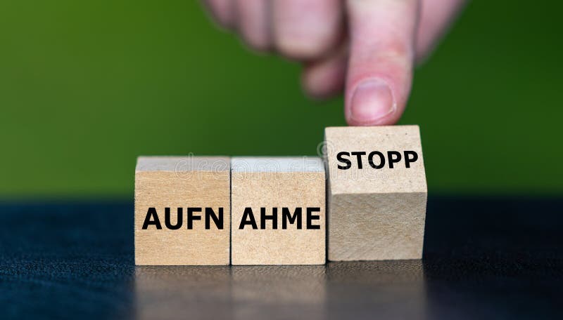 Wooden Cubes Form the German Expression Aufnahme Stopp (migration Stop ...