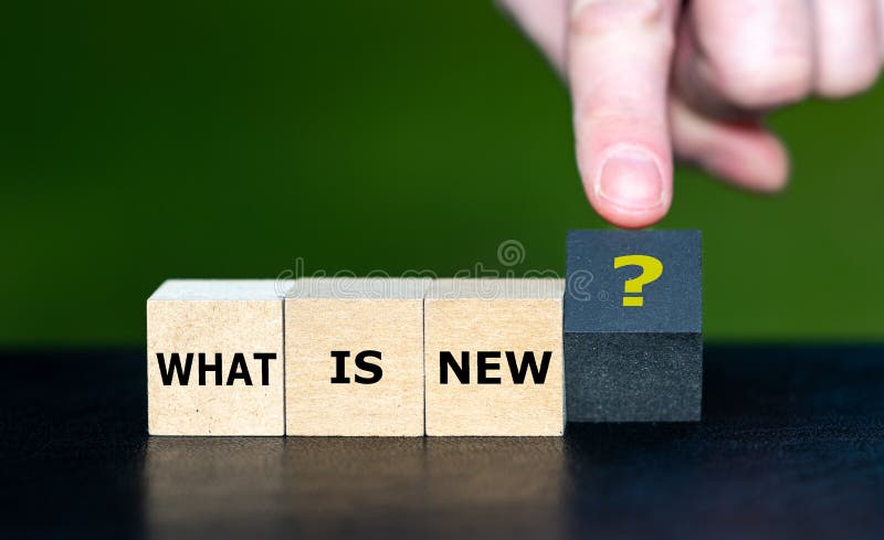 Wooden Cubes Form the Question What is New. Stock Photo - Image of ...