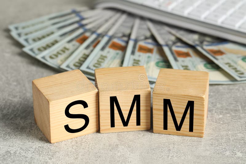 Wooden Cubes with Letters SMM on Grey Stone Table Stock Photo - Image ...