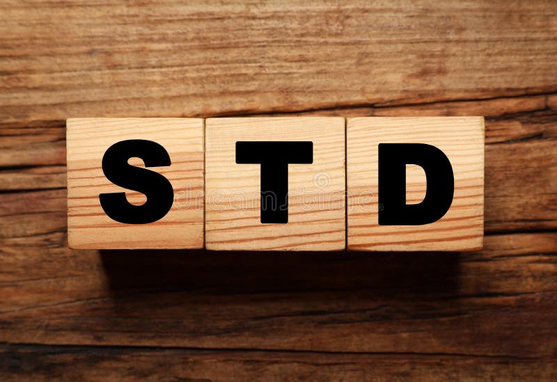Wooden Cubes with Letters STD Sexually Transmitted Diseases on Table ...