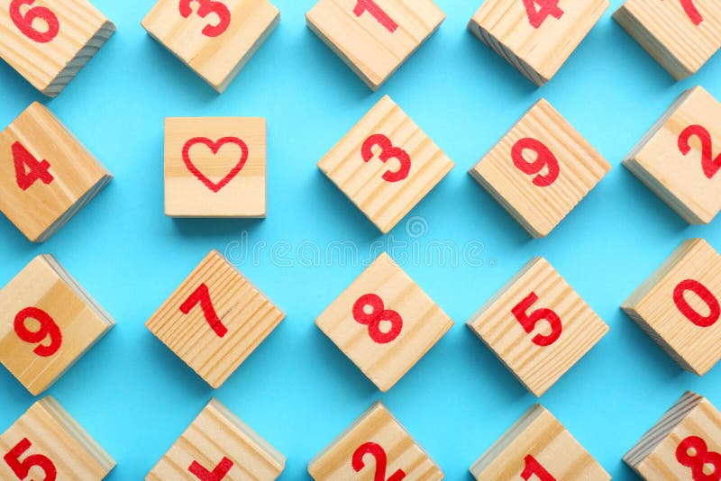 Wooden Cubes with Numbers and Heart on Light Blue Background, Flat Lay ...