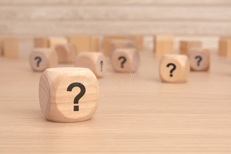 Wooden Cubes with a Question Mark Engraved on Them, Front View Stock ...