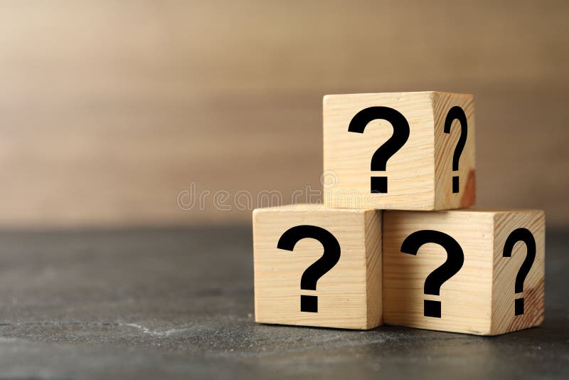 Wooden Cubes with Question Marks on Stone Table, Closeup. Space for ...