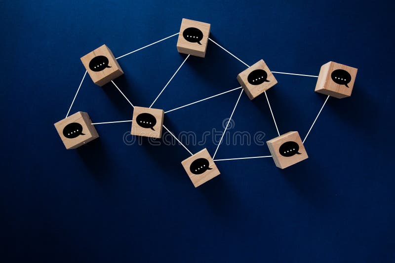 Wooden Cubes Representing a Business Network Communicating with Each ...