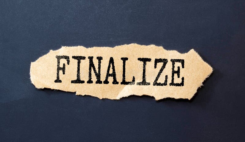 Wooden Cubes with Word FINALIZE on the Office Desk. Folder and Other ...