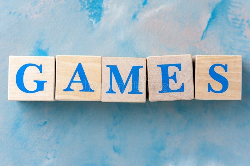 Games Word Written on Wood Block. Games Text on Table, Concept Stock ...