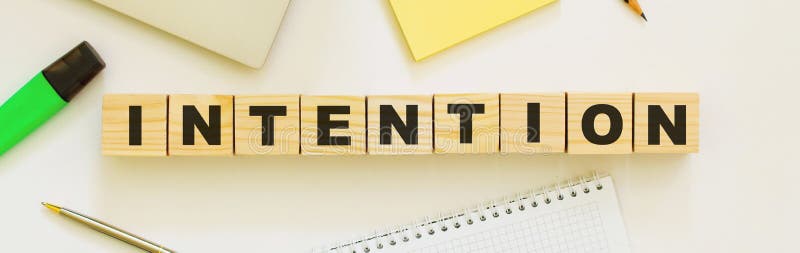 Wooden Cubes with Word INTENTION on the Office Desk. Folder and Other ...