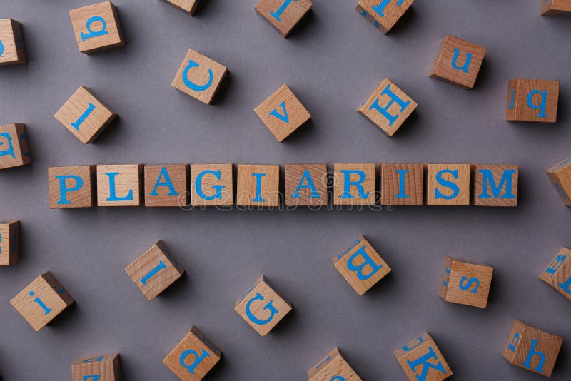 Word Plagiarism Made of Wooden Cubes on Violet Background, Top View ...