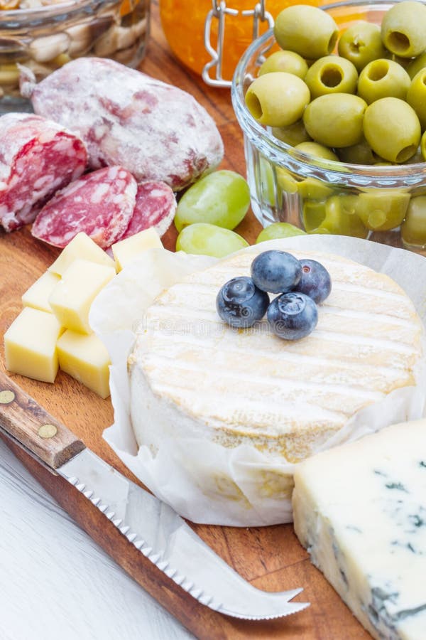 Cheese and cold cuts stock image. Image of gourmet, green - 27481433