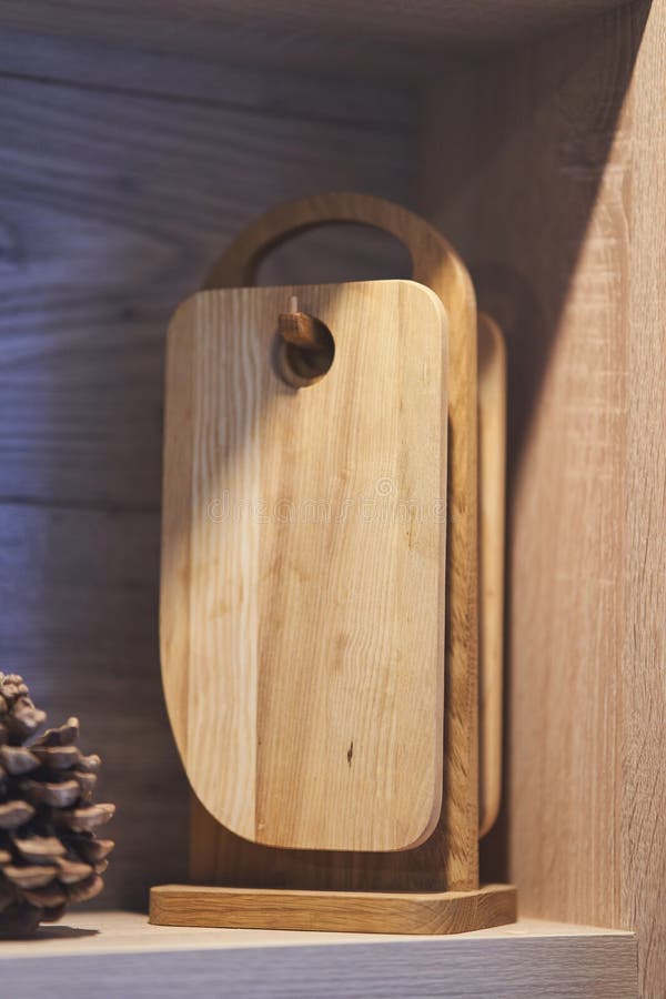 Wooden Cutting Boards Stand on the Kitchen Shelf Stock Image - Image of ...