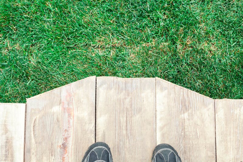 Wooden Dais with Feet and Grass As a Background Stock Image - Image of ...