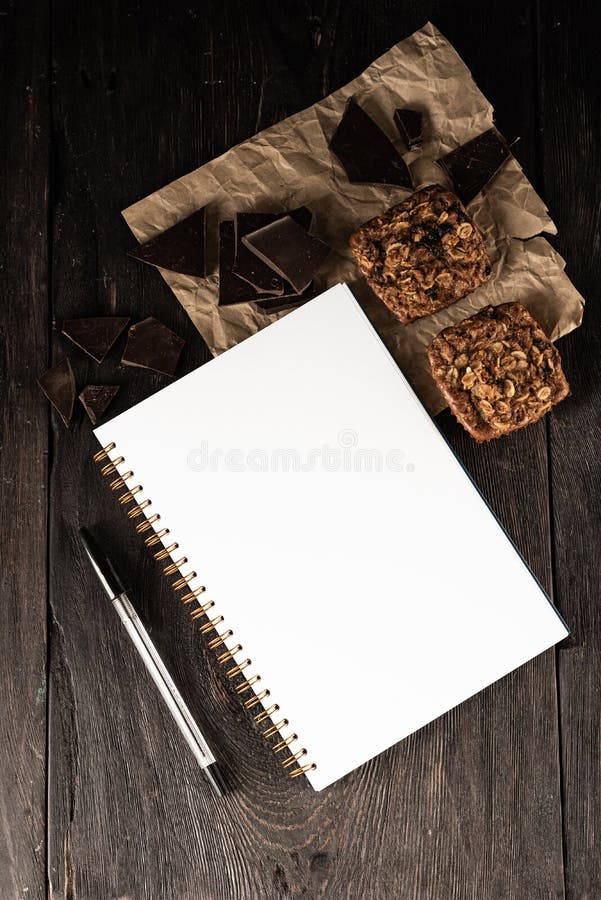 Notebook for Culinary Notes and a Pen on the Table. Muffins and Pieces ...
