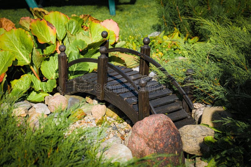 Wooden Decorative Bridge among Stones Stock Photo - Image of grass ...