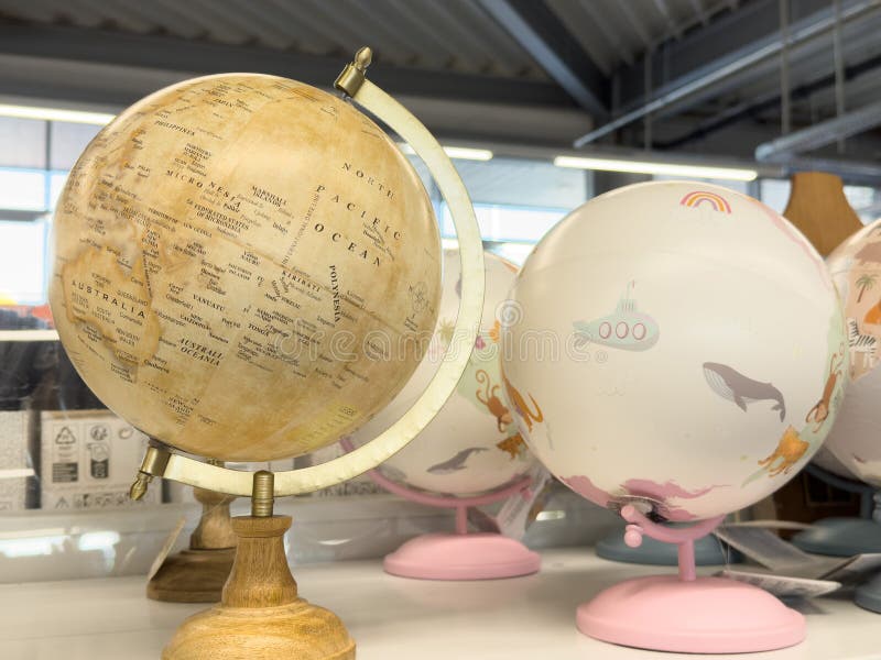 Wooden and Decorative Globes on Display in Store Setting Editorial ...