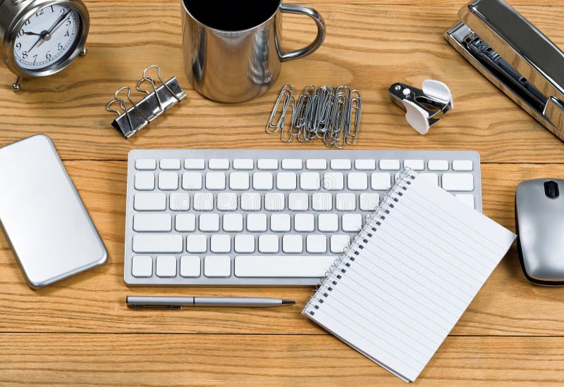 Wooden Desktop with Silver Color Working Items Stock Image - Image of ...