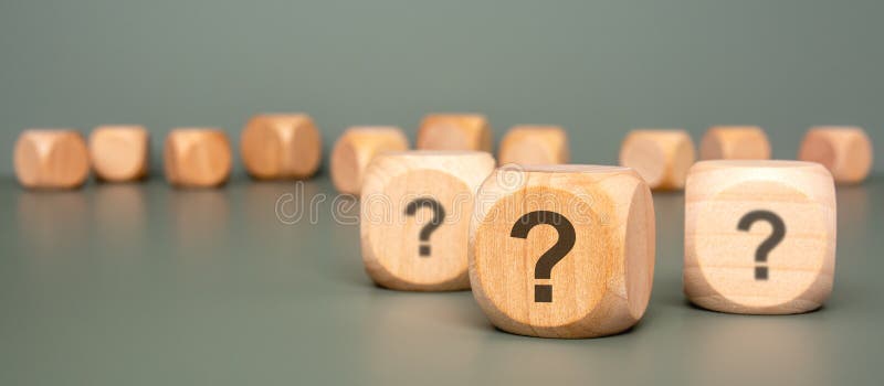 Wooden Dice Featuring Question Marks Displayed on a Vibrant Green ...