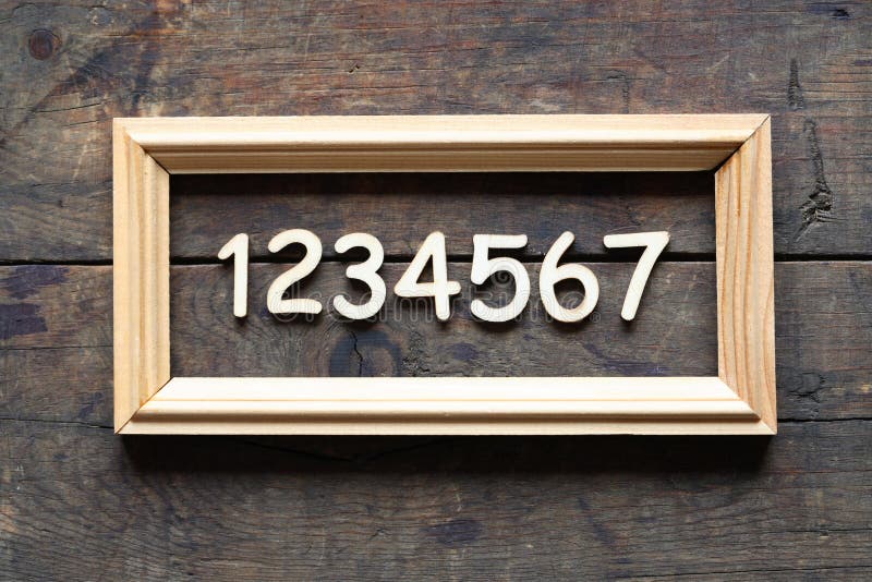 Wooden Digits in Frame stock image. Image of education - 76169867