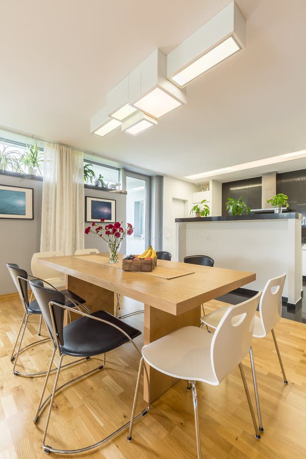 Wooden dining table stock image. Image of space, house - 100211355