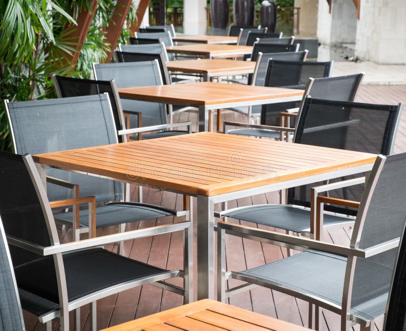 Wooden dining tables stock photo. Image of lunch, estate - 45481112