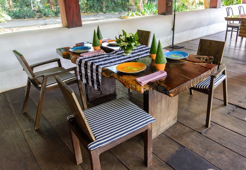 Wooden dinning table stock image. Image of tablecloth - 36518117