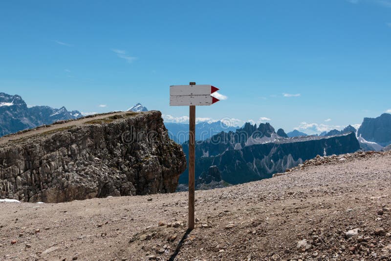 Wooden Direction Path Sign in Barren Rocky Mountain Stock Image - Image ...