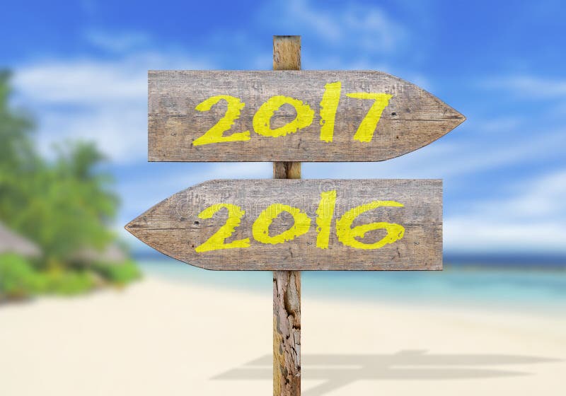 Wooden Direction Sign with 2017 and 2016 Stock Image - Image of travel ...