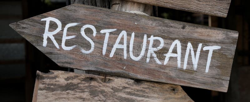 Wooden Direction Sign Pointing To Left Stock Photo - Image of still ...