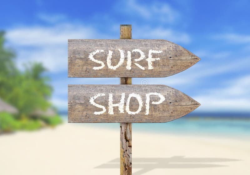 Wooden Direction Sign with Surf Shop Stock Photo - Image of route ...