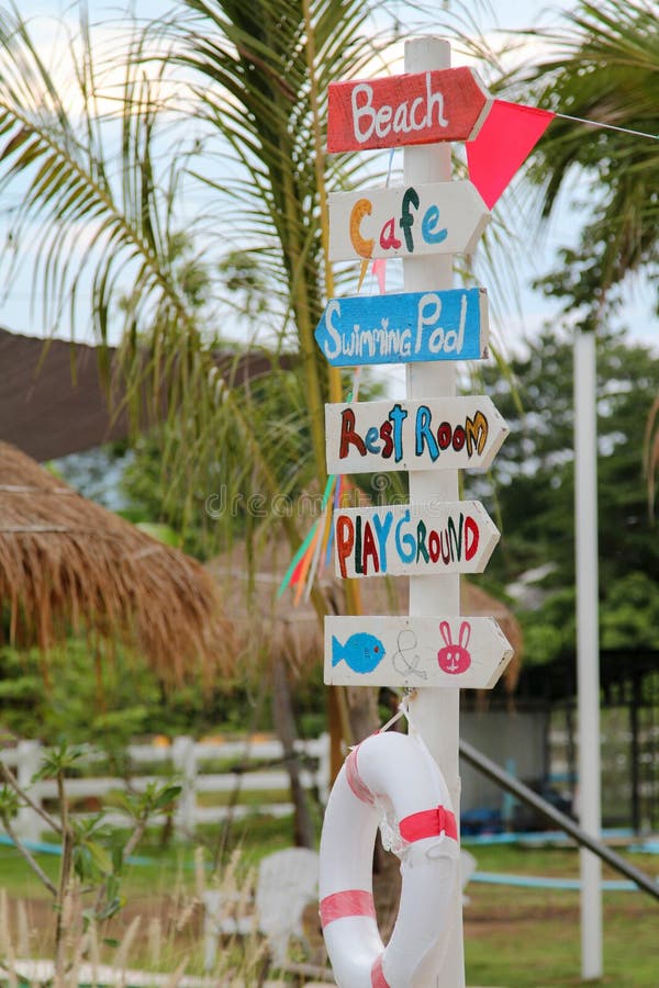 Directional Signs on the Beach Stock Photo - Image of summer, plank ...