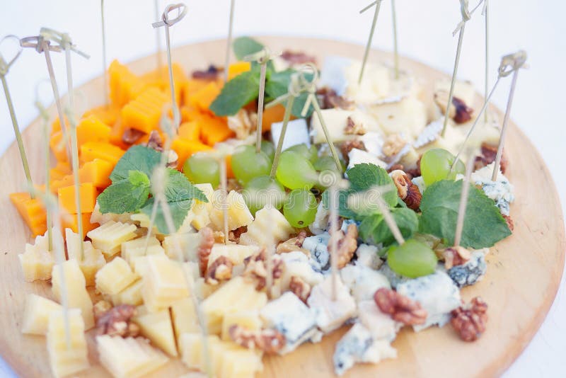 Wooden Dish with Different Types of Cheese Stock Photo - Image of copy ...