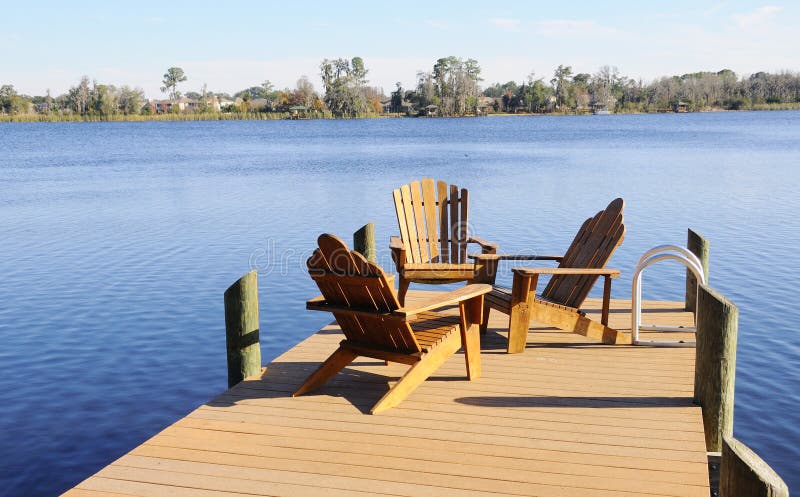 Lounge Chairs on Dock stock photo. Image of sunny, lounge - 4803358